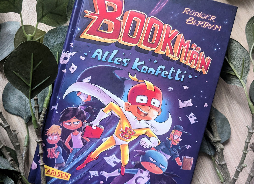 "Bookmän: Alles Konfetti" von Rüdiger Bertram #Rezension - Heldenhaushalt